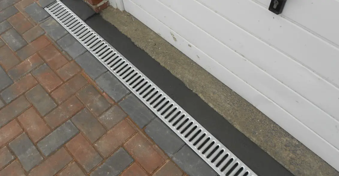The Simple Drainage Fix for Your Garage & Driveway